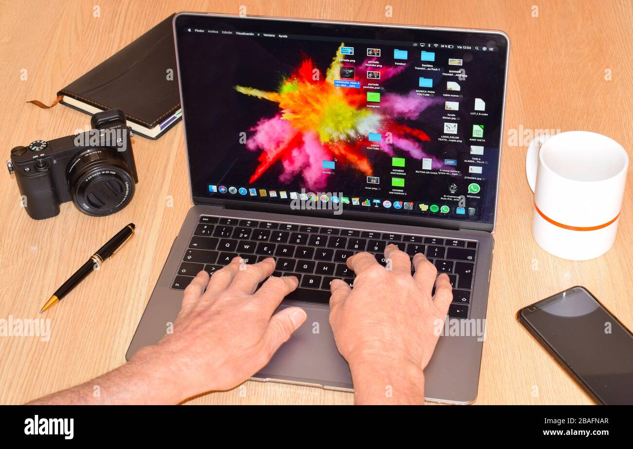 Working with computer Stock Photo - Alamy