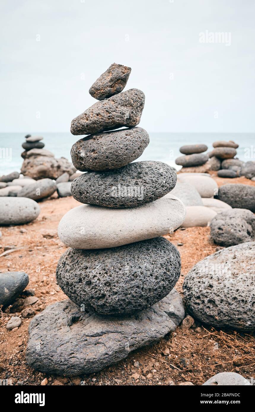 Stone stack on a beach, balance concept, color toning applied Stock ...