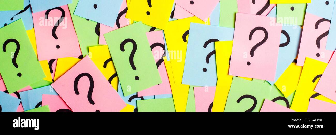Too Many Questions. Pile of colorful paper notes with question marks ...