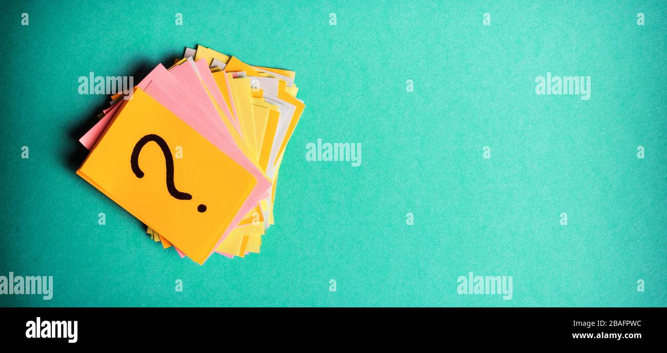 Too Many Questions. Pile of colorful paper notes with question marks ...