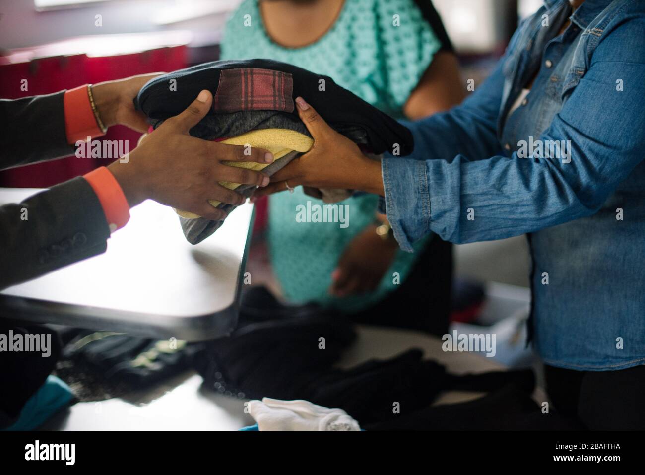 Hands sorting hi-res stock photography and images - Alamy