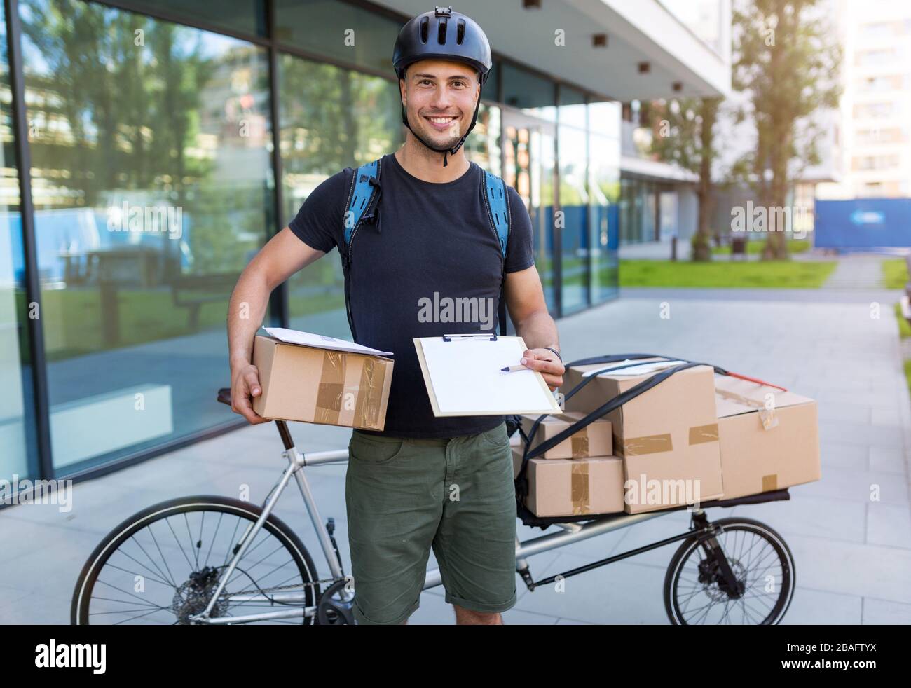 Messenger on a bike hi-res stock photography and images - Alamy