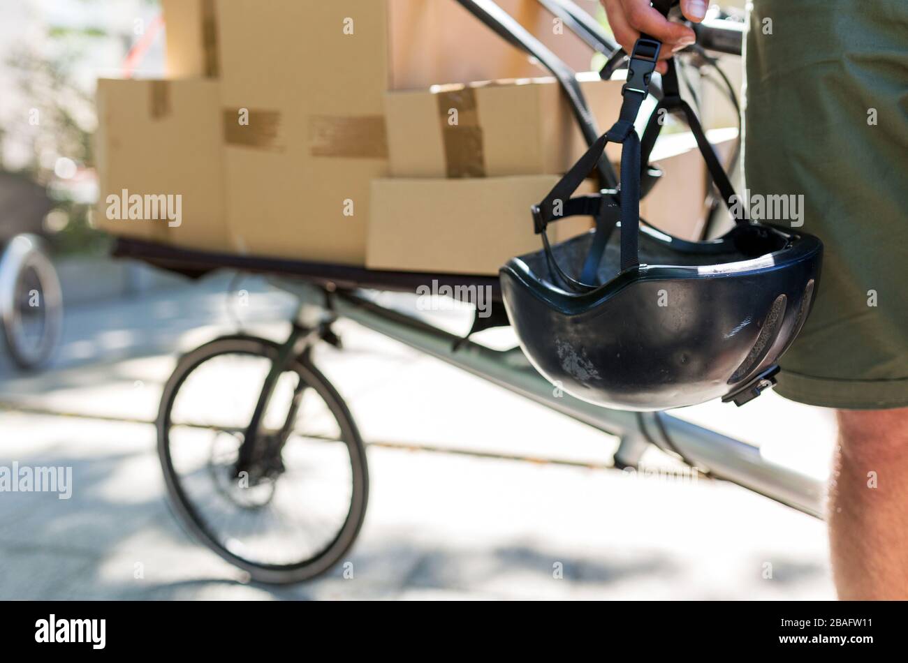 Messenger on a bike hi-res stock photography and images - Alamy