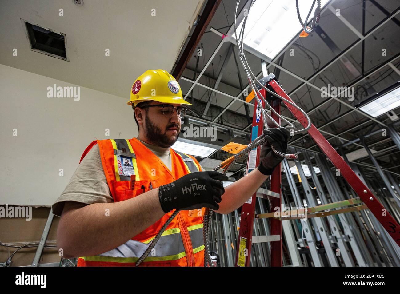Los Angeles, USA. 12th Mar, 2020. IBEW Local 11 electricians helping to ...