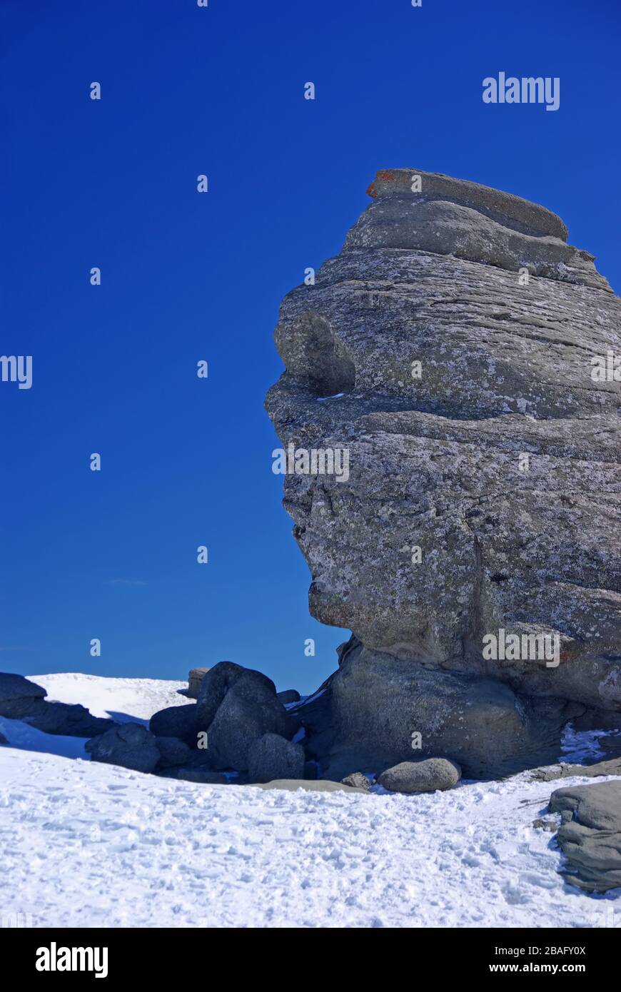 Natural rock formation like a human face in Romanian Carpathians ...