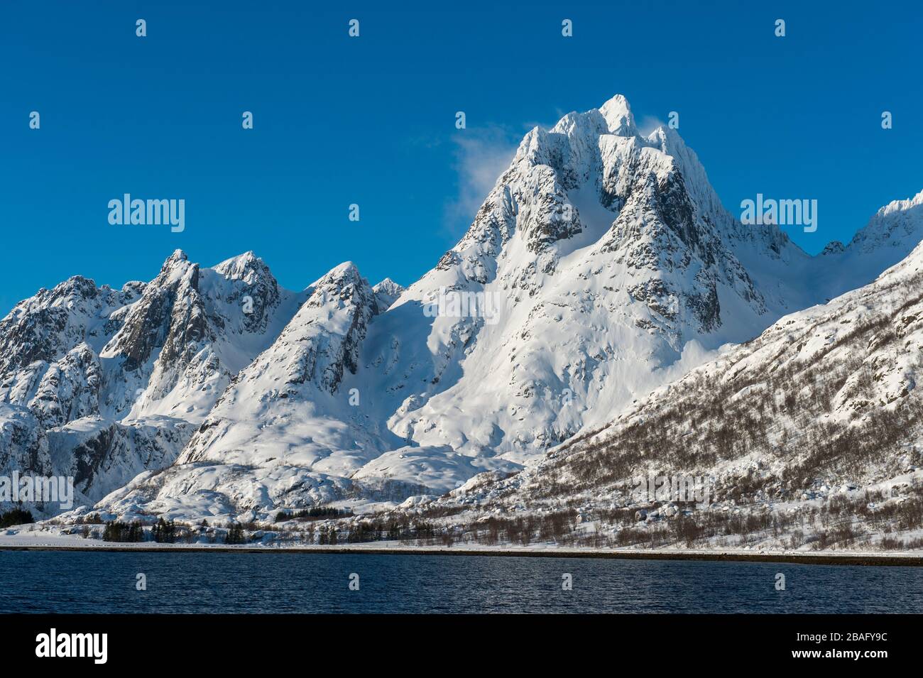 View of fjords with snow covered mountains near Svolvaer, a fishing ...