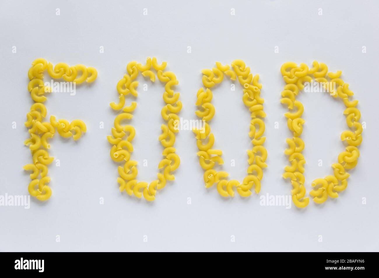 Word food. Italian food concept and menu design. Uncooked pasta on ...