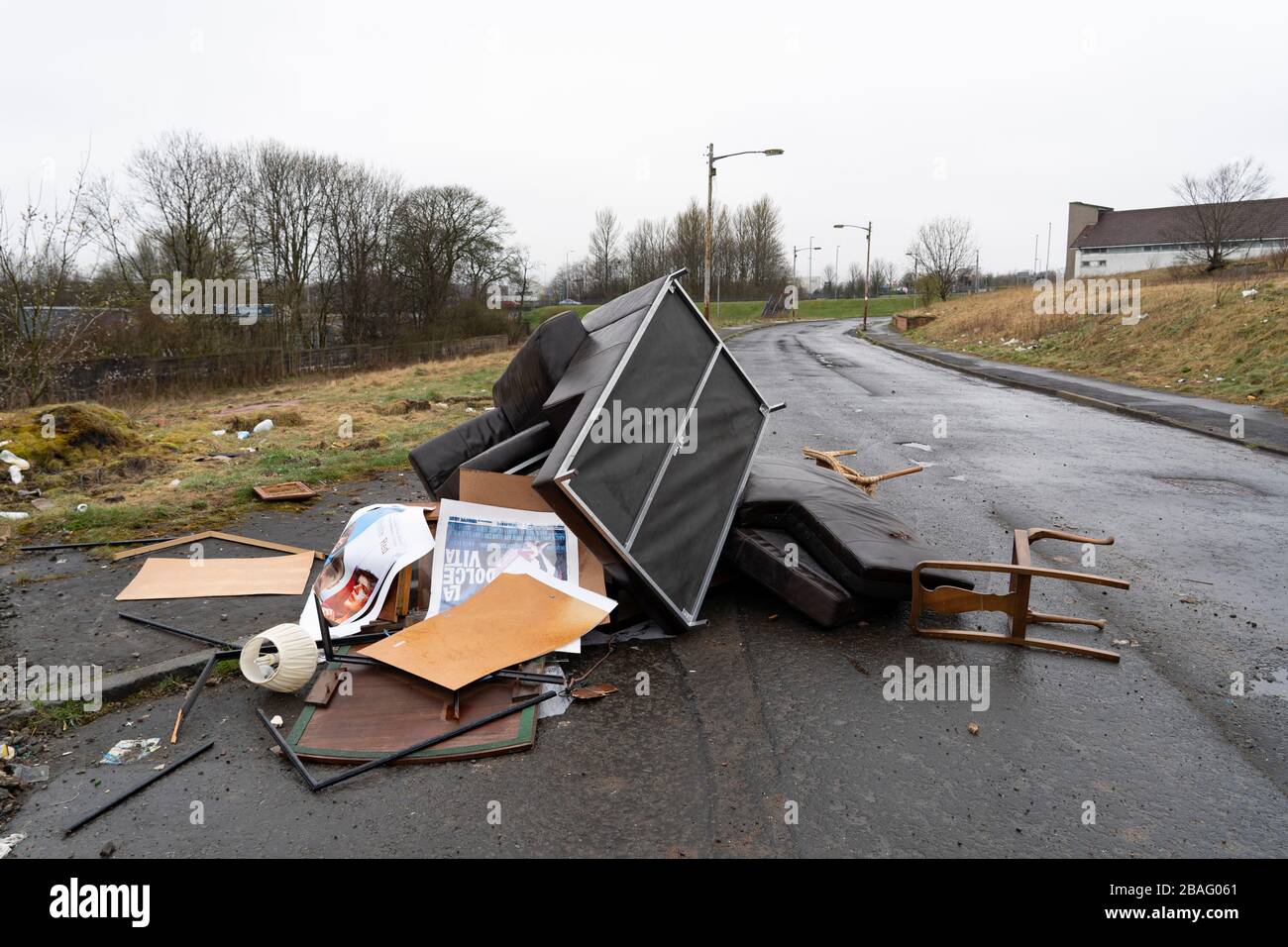 Fly tipping of household goods on street in Easterhouse in Glasgow ...
