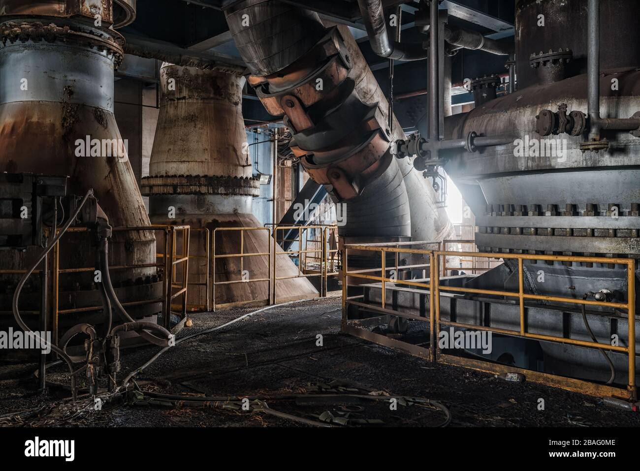 Interior of an old abandoned industrial steel factory Stock Photo - Alamy