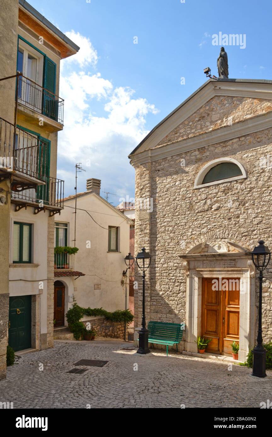 A narrow street between the old houses of Monteroduni, a village in the ...