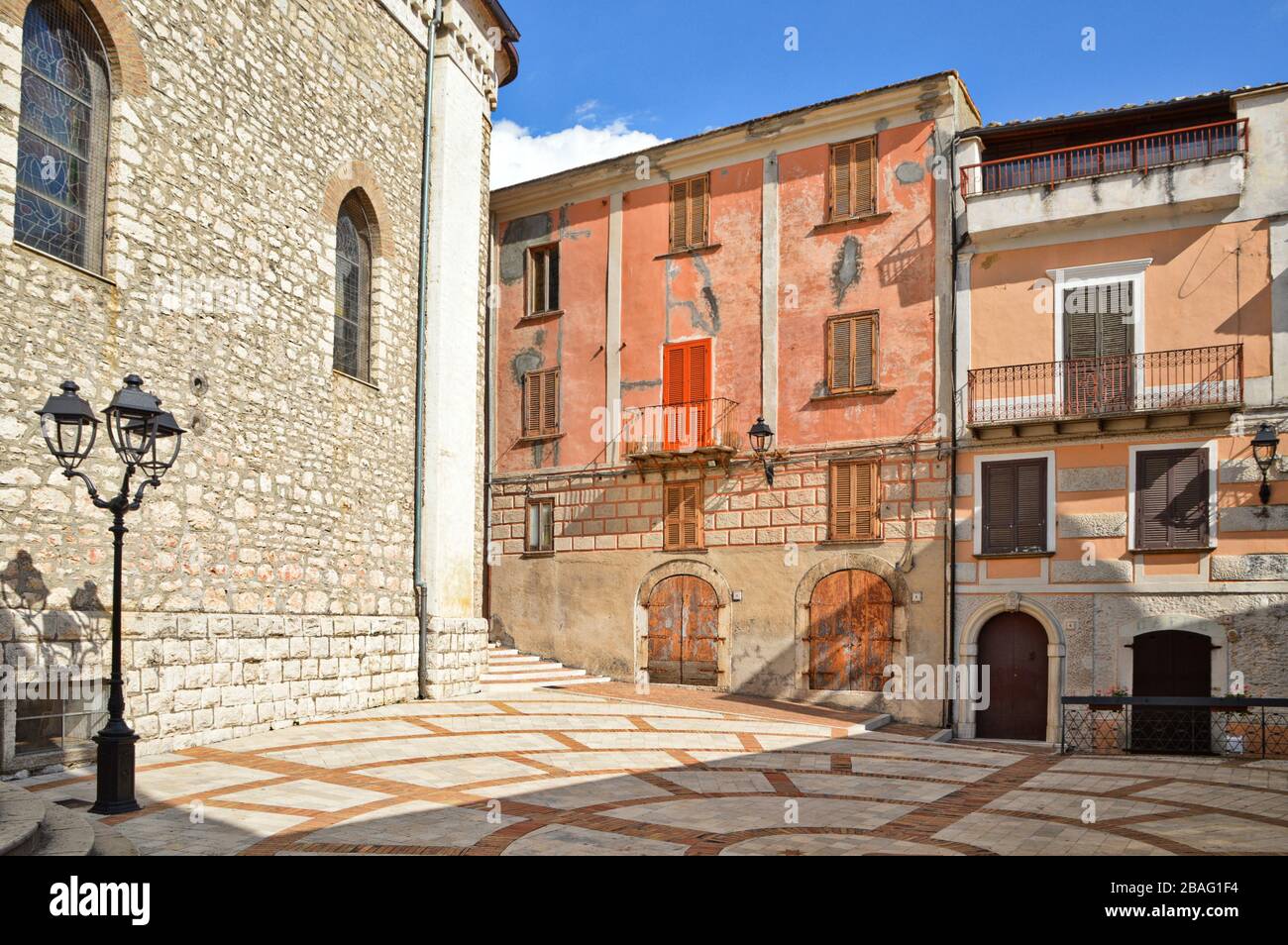 A narrow street between the old houses of Monteroduni, a village in the ...