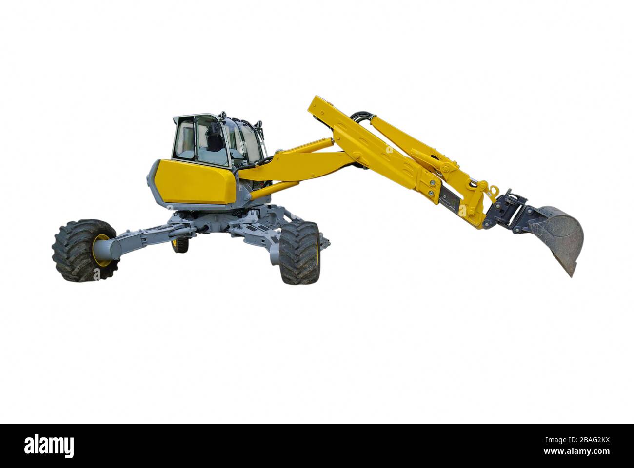 Yellow excavator, spider type, isolated over white Stock Photo - Alamy