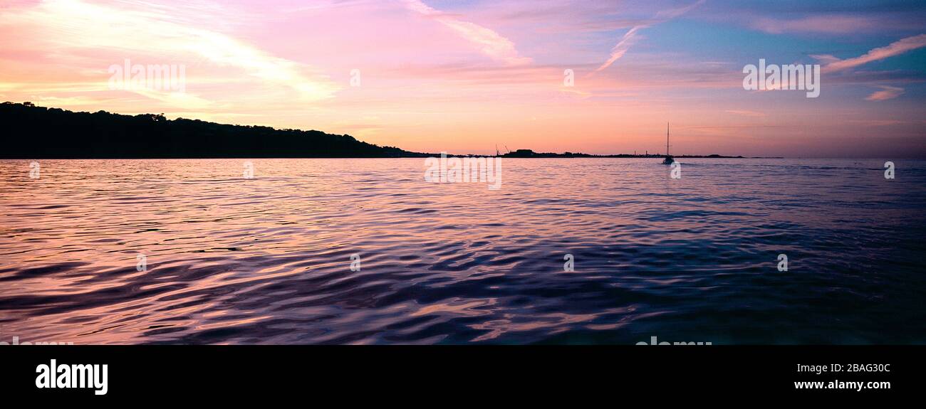 St peter port harbour guernsey sunset hi-res stock photography and ...