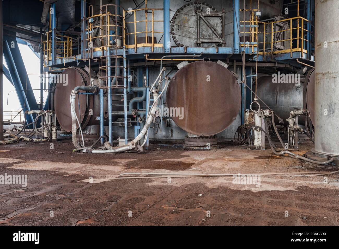 Interior of an old abandoned industrial steel factory Stock Photo - Alamy