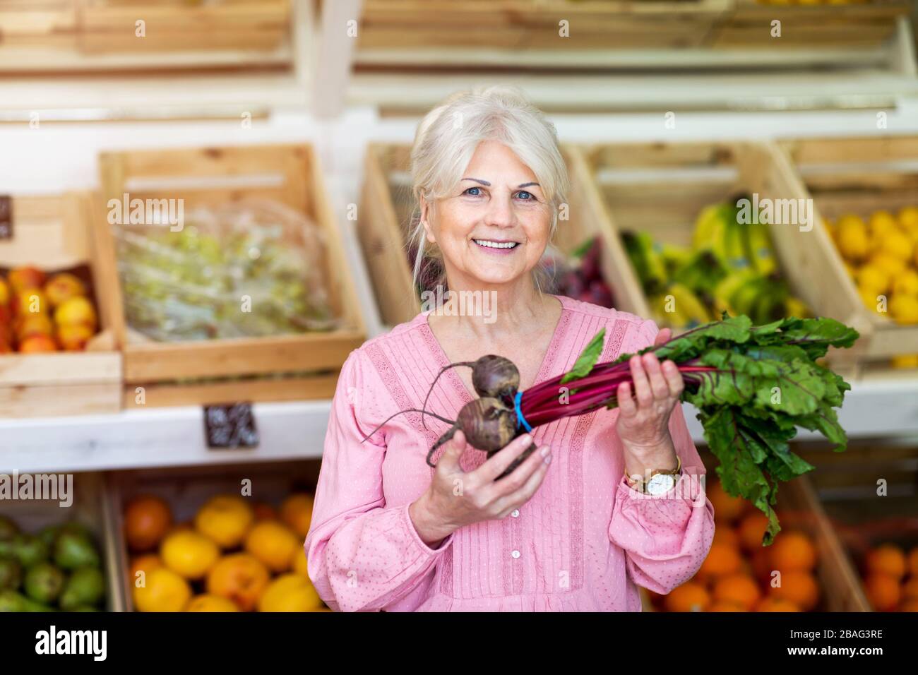Grocery owner employee hi-res stock photography and images - Alamy