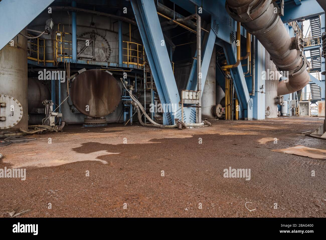 Interior of an old abandoned industrial steel factory Stock Photo - Alamy