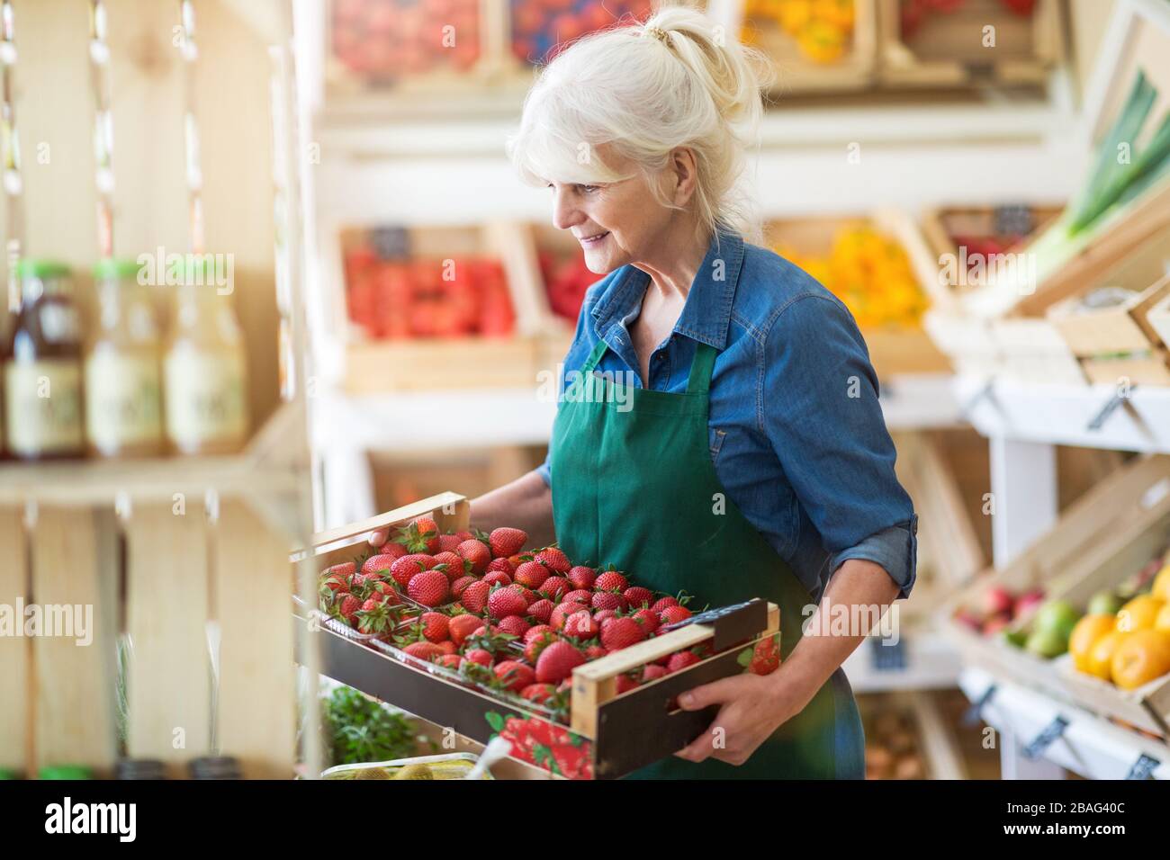 Elderly person working in supermarket hi-res stock photography and ...