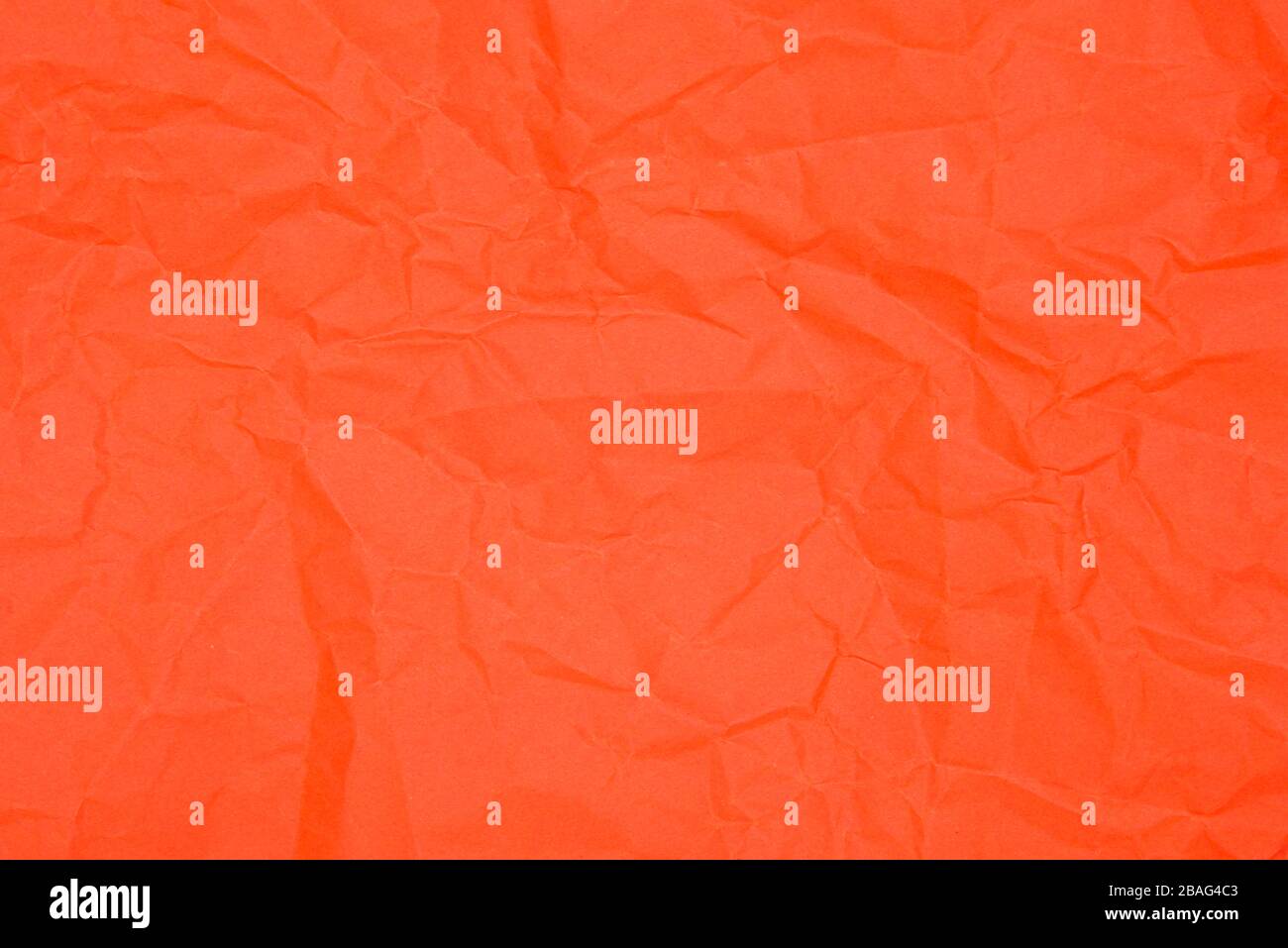 Red crumpled paper as texture, close up image Stock Photo - Alamy