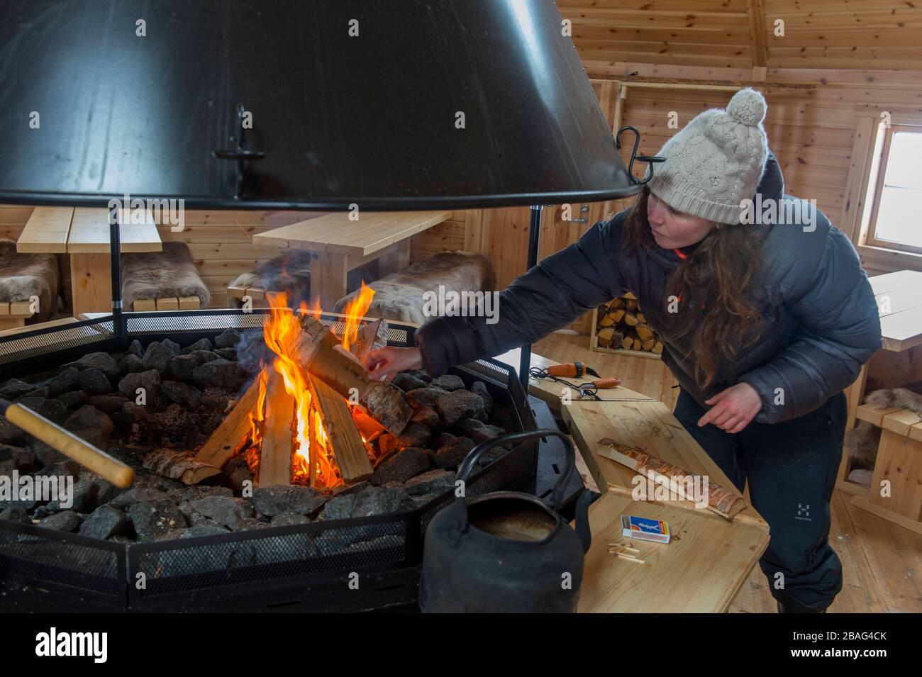 People warming in winter with fire hi-res stock photography and images ...