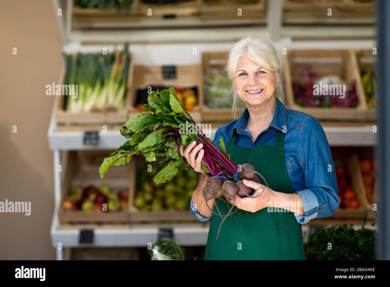 Grocery owner employee hi-res stock photography and images - Alamy