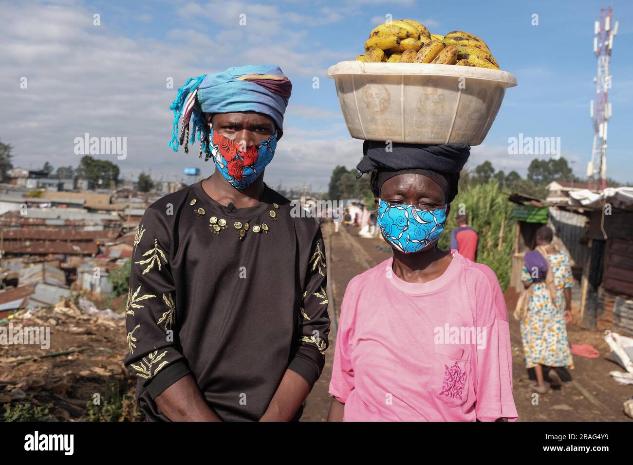 Nairobi, Kenya. 26th Mar, 2020. David Avido and a local business woman ...
