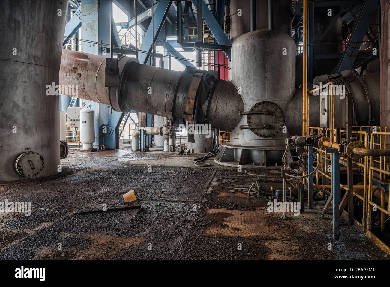 Interior of an old abandoned industrial steel factory Stock Photo - Alamy