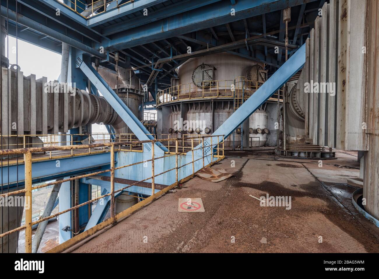 Interior of an old abandoned industrial steel factory Stock Photo - Alamy