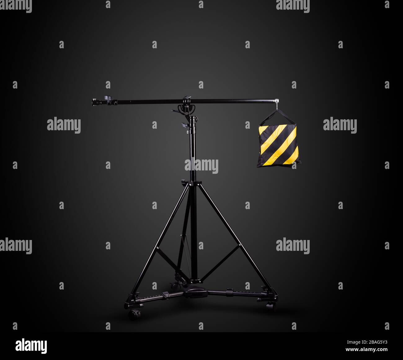 Photo studio lighting stands isolated on the black background Stock ...