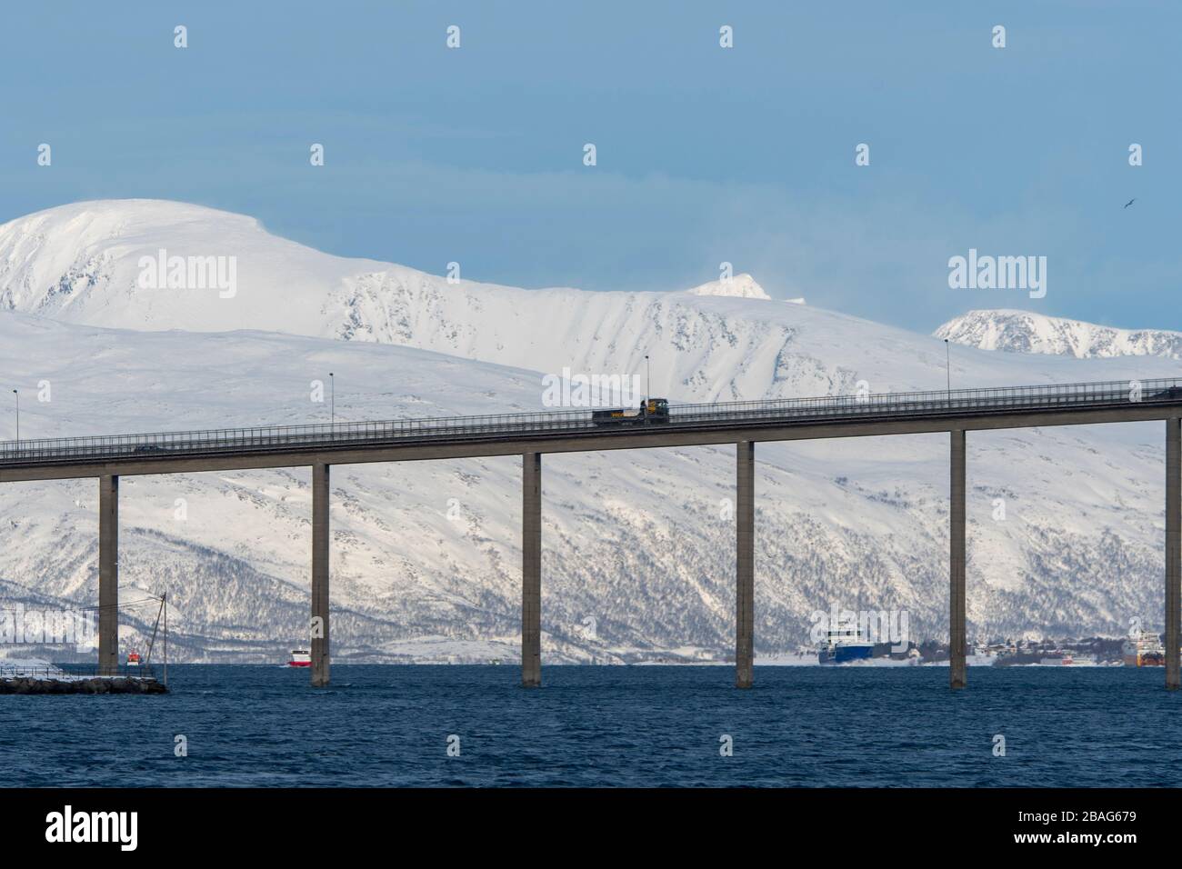 View from Tromso Fjord of Tromso Bridge, which is a cantilever road ...