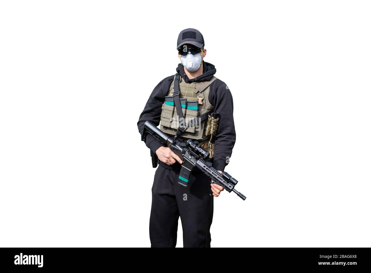 Army Man wearing Tactical Uniform and holding Machine Gun in Hands and ...