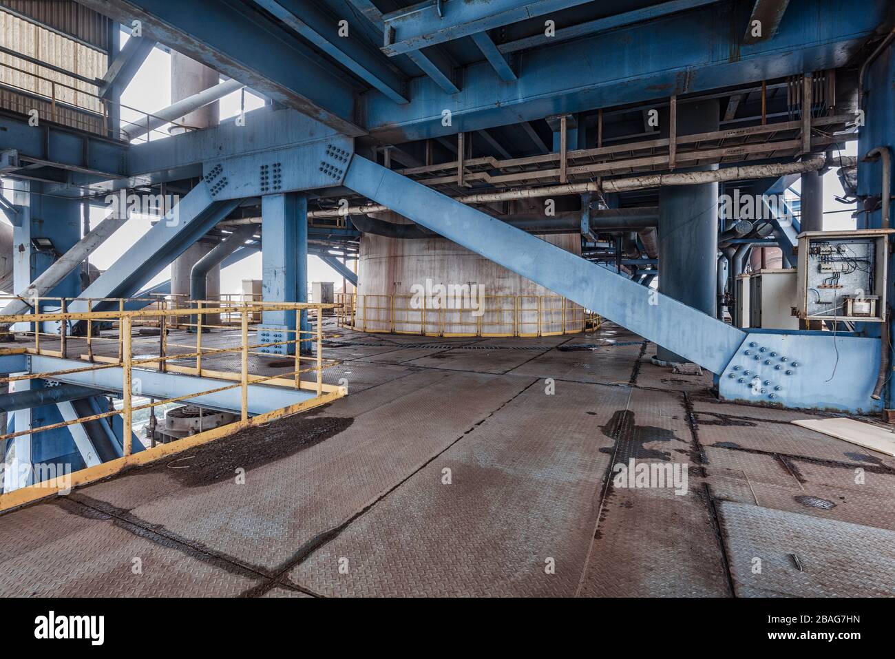 Interior of an old abandoned industrial steel factory Stock Photo - Alamy