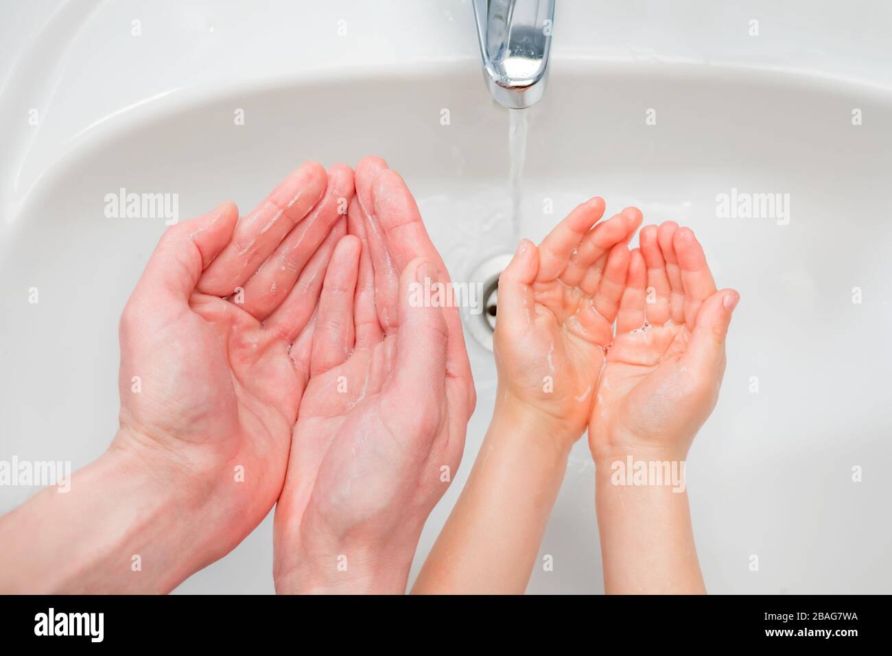 Hygiene concept, thorough hand washing with water and soap, important ...