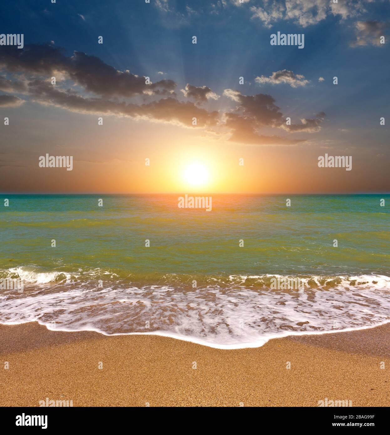 nice sunset over sea beach Stock Photo - Alamy