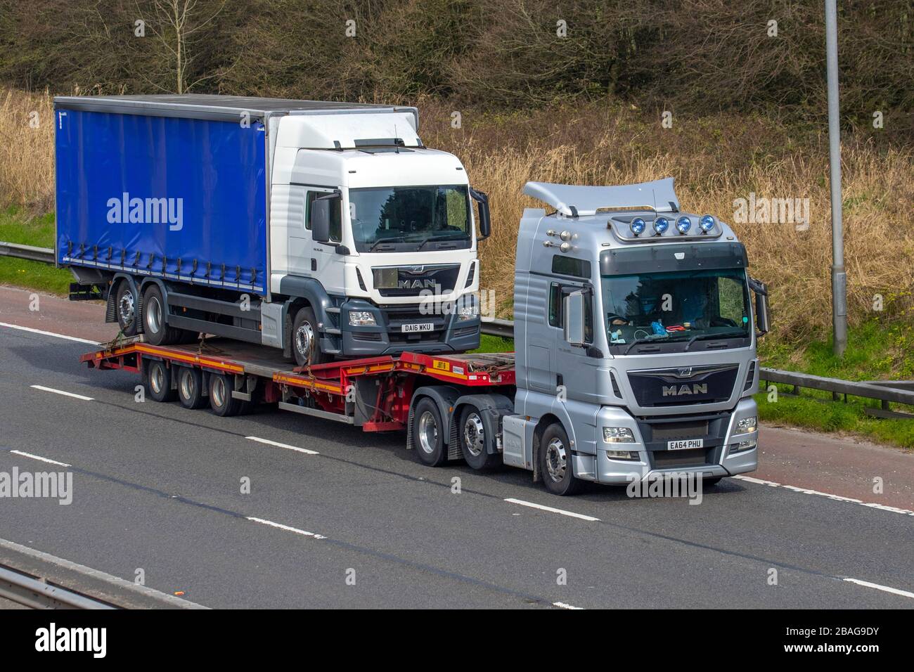 Lorry on lowloader hi-res stock photography and images - Alamy