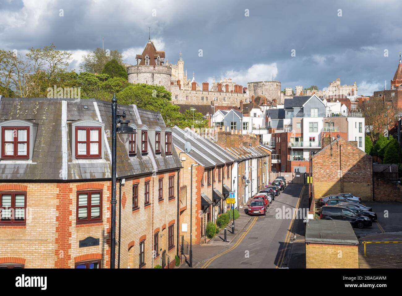 View from above of a street lined with traditional terraced houses in a ...