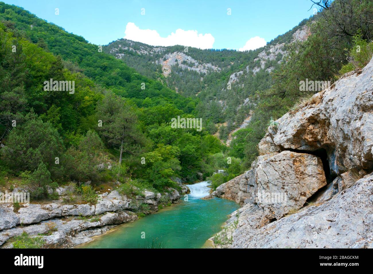 scene with mountain river with emerald water Stock Photo - Alamy