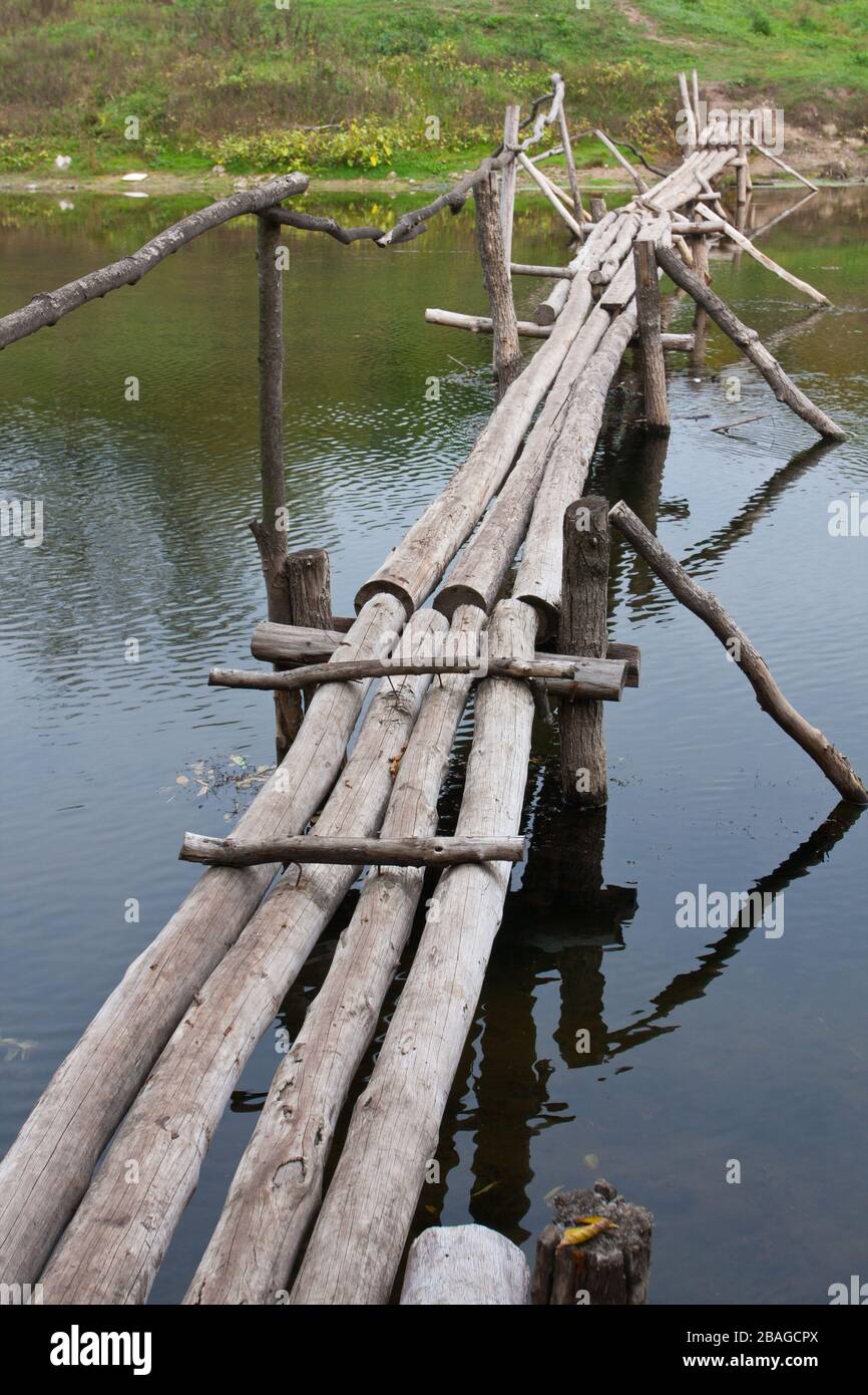 wooden bridge over river Stock Photo - Alamy