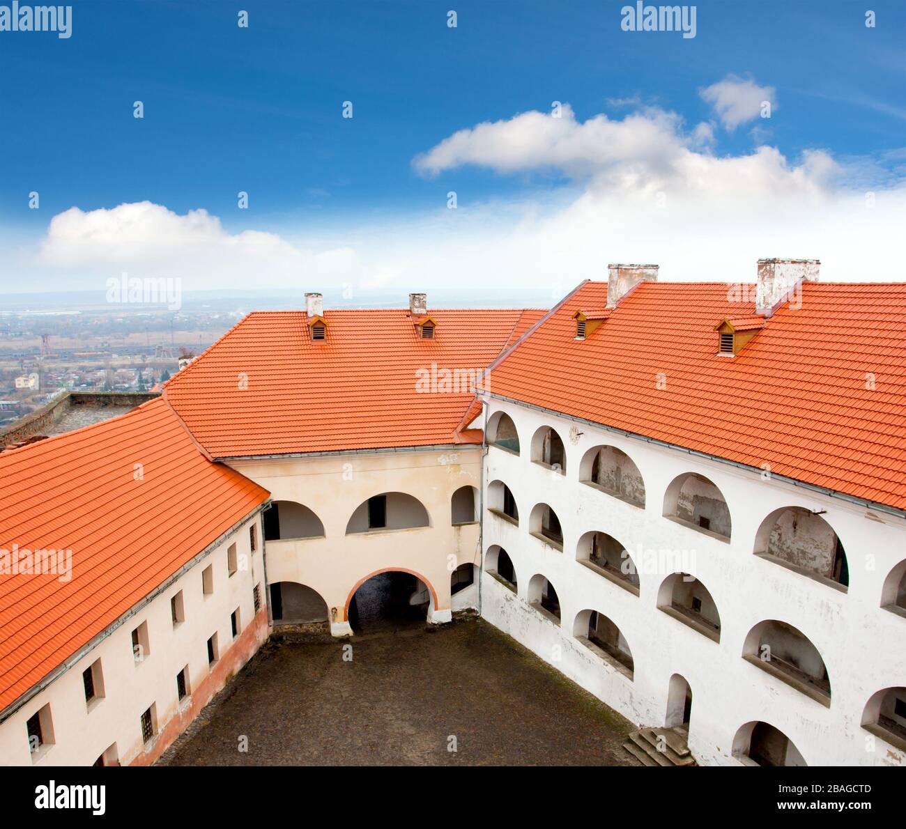 Old castle with red tiled roof Stock Photo - Alamy