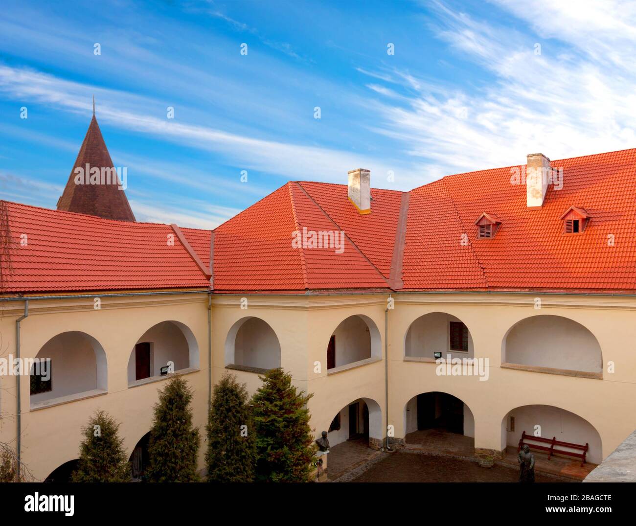 Old castle with red tiled roof in nice day Stock Photo - Alamy