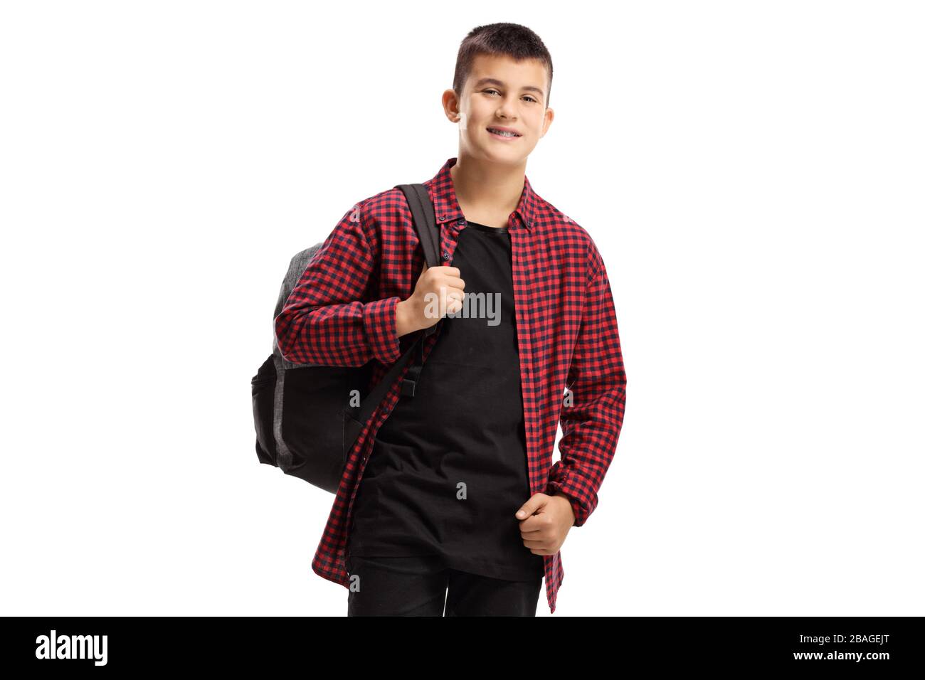 Teenage boy with a backpack smiling at the camera isolated on white ...