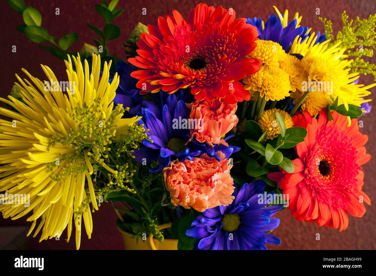 Multicolored flowers including mums,chrysanthemums,carnations in yellow ...