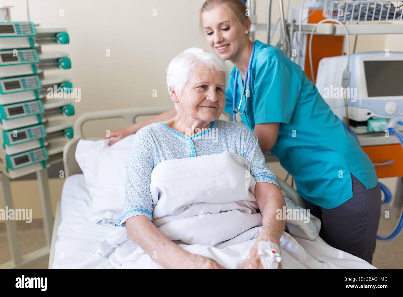 Senior patient and nurse in hospital Stock Photo - Alamy