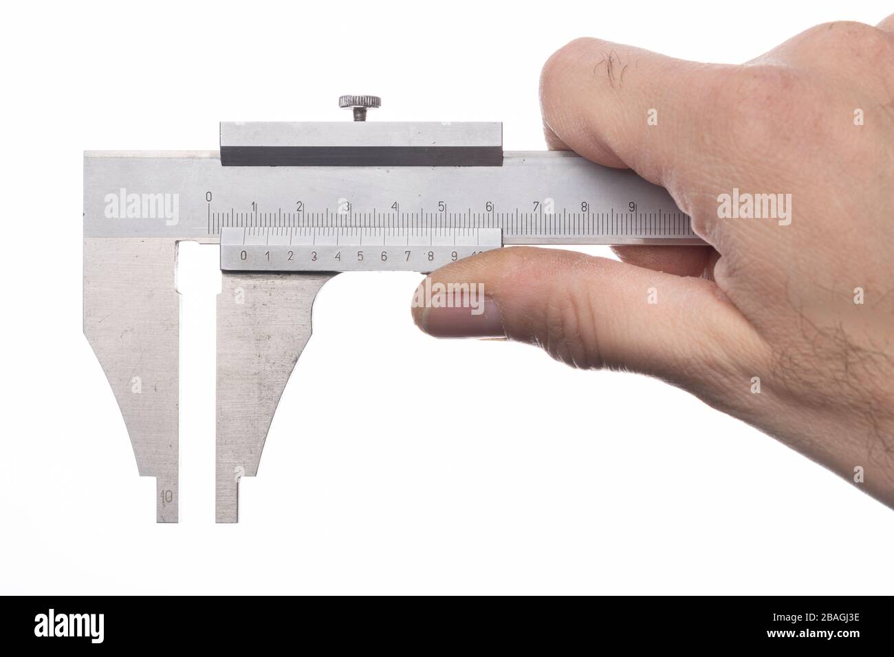 Caliper held in a male hand. Measuring instruments for locksmiths ...