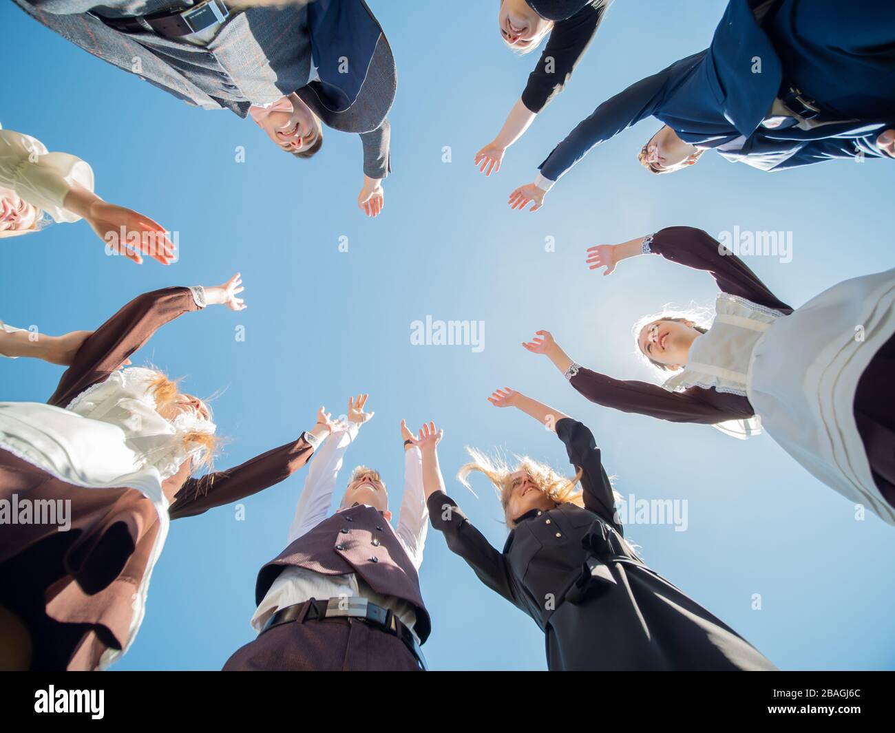 Friendly friends spread their hands. The concept of strong friendship ...