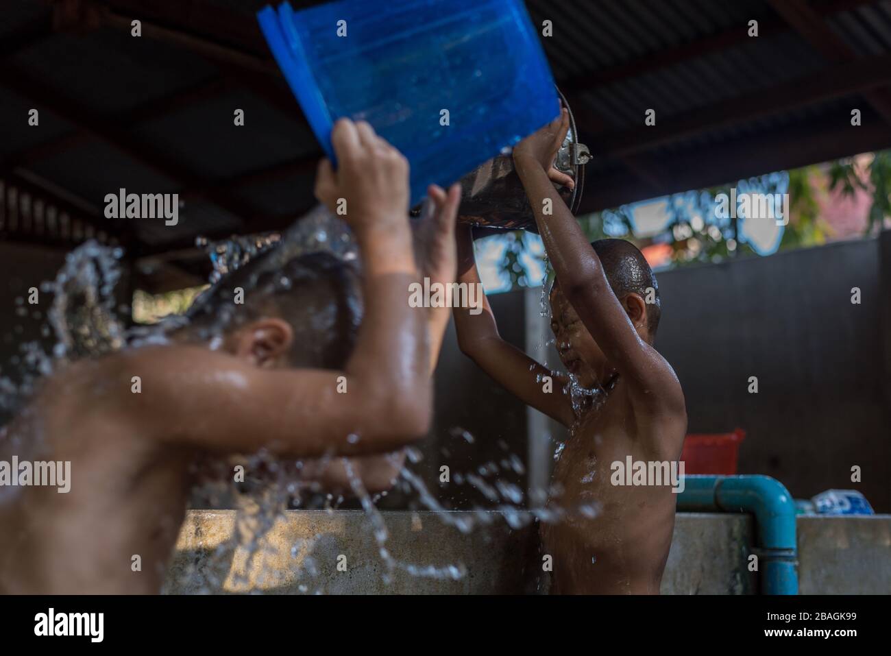 Monks showering, Bagan, Myanmar Stock Photo - Alamy