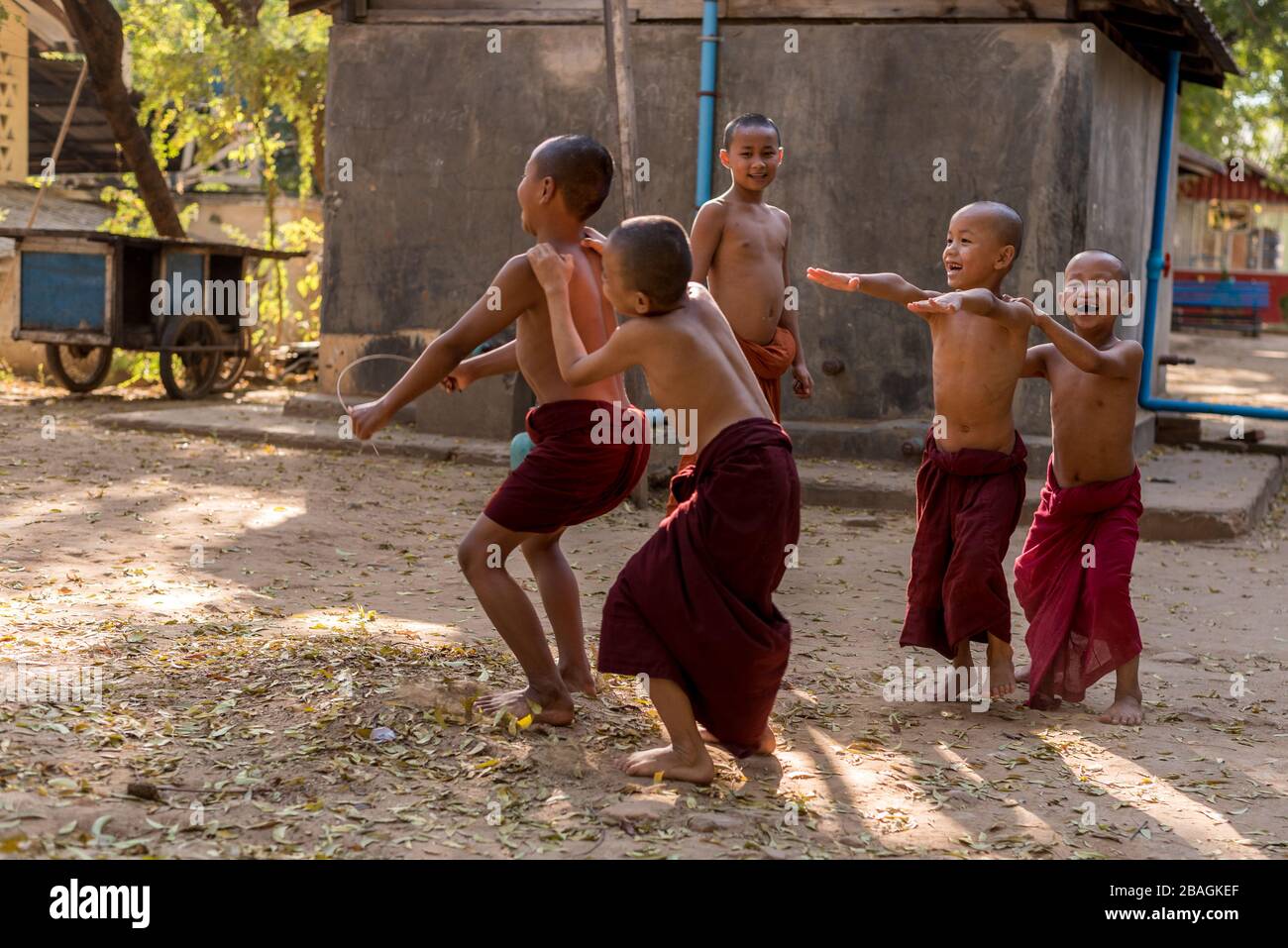 Novice monks play in their monastery, Bagan, Myanmar Stock Photo - Alamy