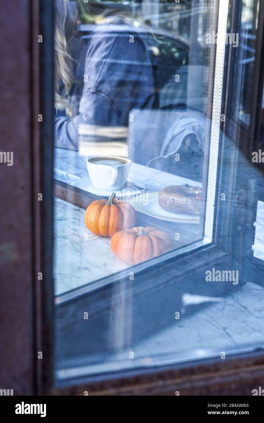 a young girl's cafe window reflection Stock Photo - Alamy