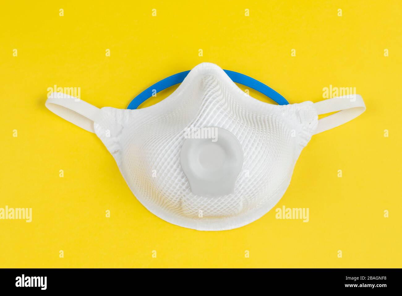 ffp2 mask on yellow background for protect droplets infectious disease ...