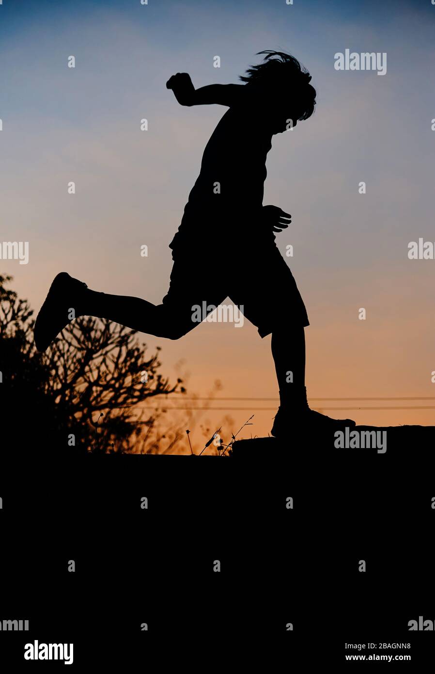 Boy running silhouette hi-res stock photography and images - Alamy