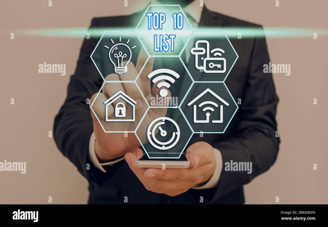 Writing note showing Top 10 List. Business concept for the ten most ...